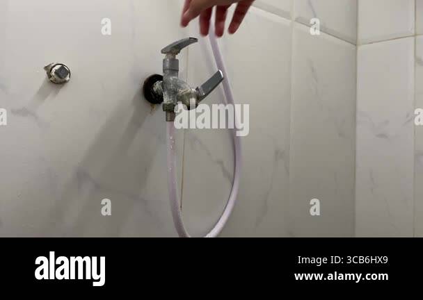 An asian female hand open and close tap water in bathroom Stock Video ...