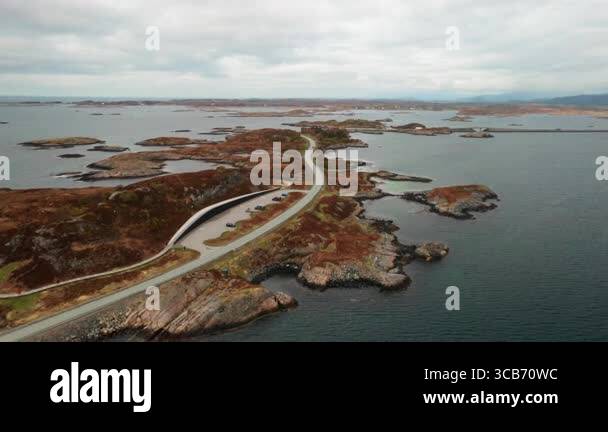 Extensive Atlantic ocean road gracefully weaves across small islands ...