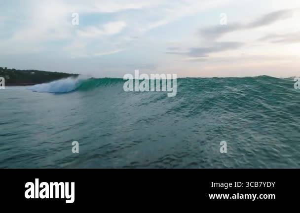 Slow-Motion Ocean Wave Crashing Near The Shore, Captured on Bali ...