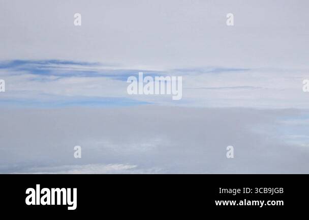 blue sky with white fluffy clouds from airplane flight fly over the ...