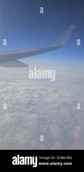 Aeroplane flying above fluffy cloud blanket with soft texture. Jet ...