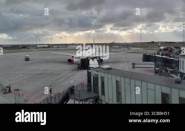 Scandinavian airlines SAS aircraft taxiing to the airport gate sleeve ...