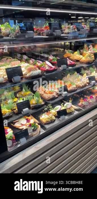 Smorrebrod traditional danish snacks assorted. Black bread with different toppings from fish and ...