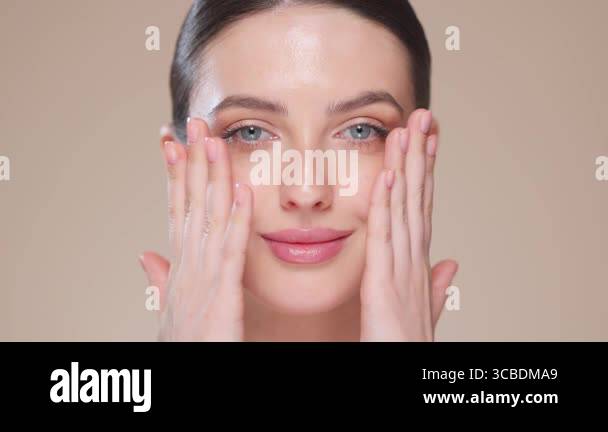 Beautiful Young Woman Touches Her Perfect Face. Natural Cosmetic ...