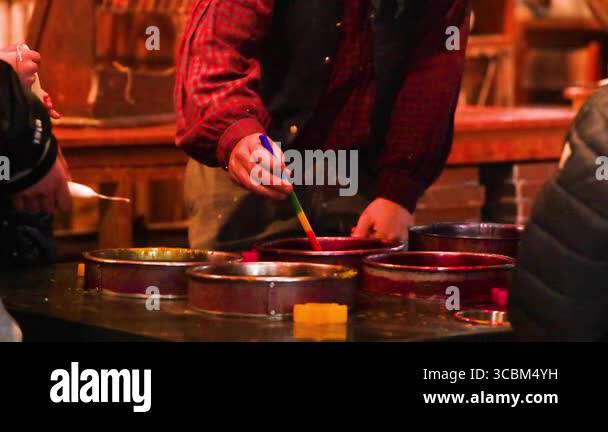 Demonstration of candle making process Stock Video Footage - Alamy
