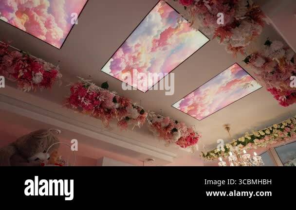 Elegant floral ceiling decor with pastel pink artificial flowers ...