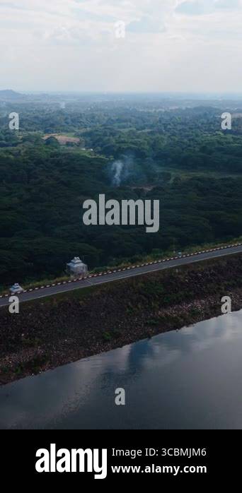 Stunning reservoir landscape with lush vegetation mountains and a ...