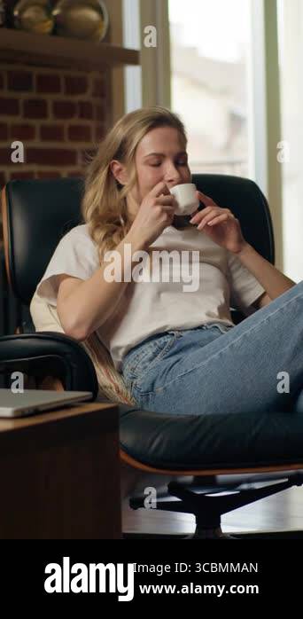 Caucasian woman freelancer resting drinking coffee cup home remote work ...