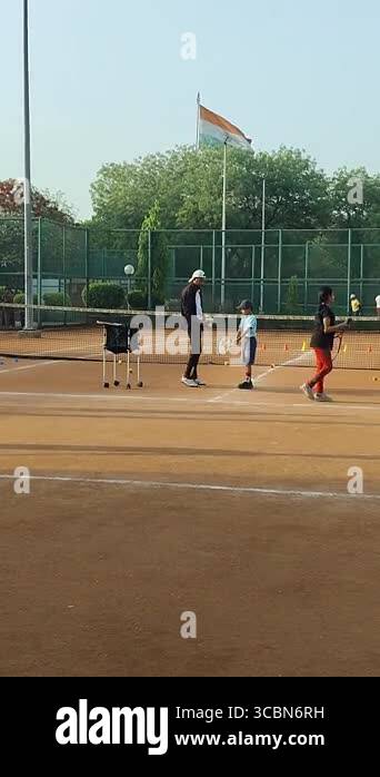 Delhi, India, February 17, 2025 - Junior tennis players having coaching ...