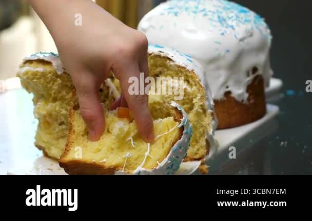 pinch off a piece of dough Womans hands take traditional sweet Easter ...