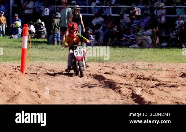 Child motocross rider racing on dirt track Stock Video Footage - Alamy