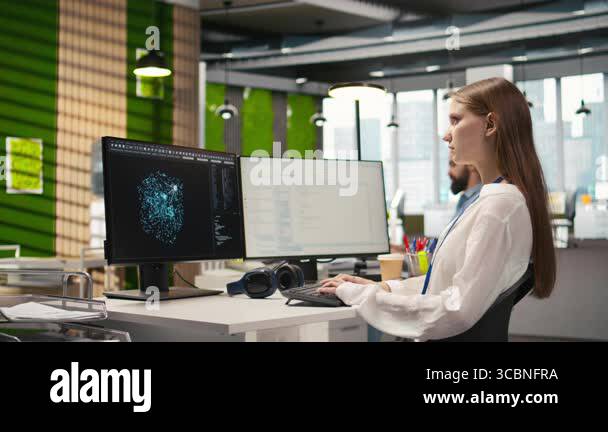 Female technician testing generative AI machine learning algorithms at ...
