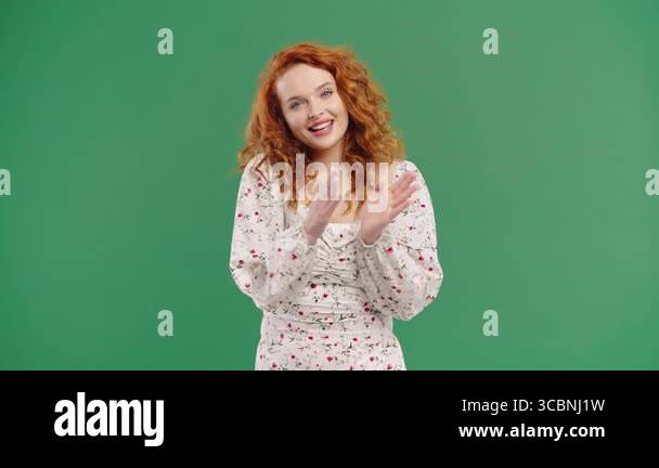 Confident charming model applauds with open smile and active body ...