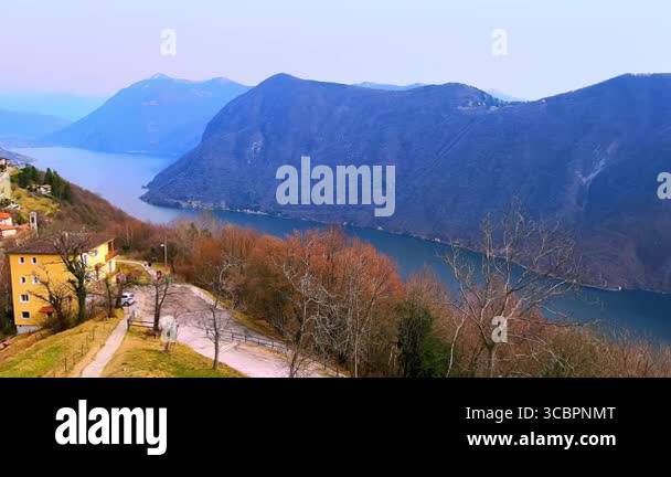 Panorama of colored houses of old Bre village located on Monte Bre and ...