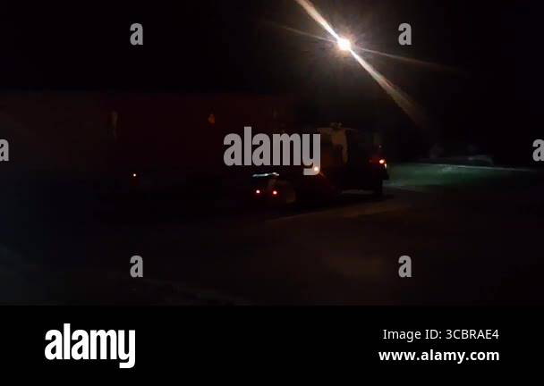 Military convoy on a road in Europe. Military convoy at a gas station ...