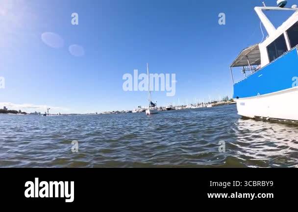 Various boats navigating through a crowded river Stock Video Footage ...