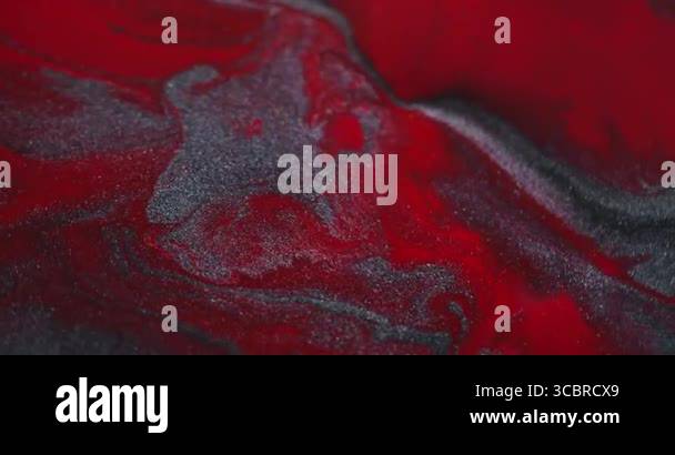 Splatter liquid. Flowing paint. Defocused red maroon silver color water ...