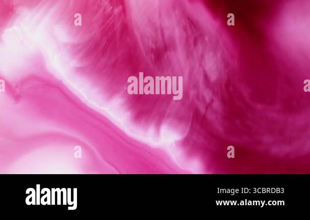 Paint blend. Marble splash. Defocused red maroon white color ink ...