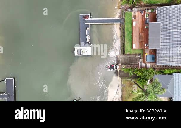 Aerial footage of sand dredging near docks Stock Video Footage - Alamy