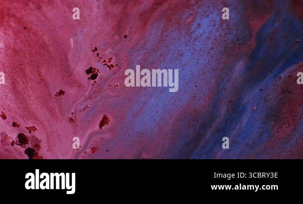 Blend flow. Color water. Defocused blue maroon pink marble particles ...