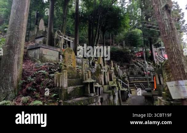A peaceful stroll through a traditional Japanese cemetery Stock Video ...