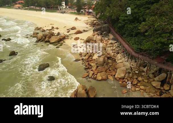 Beautiful beach scenery featuring surrounding hills and rocky shoreline ...