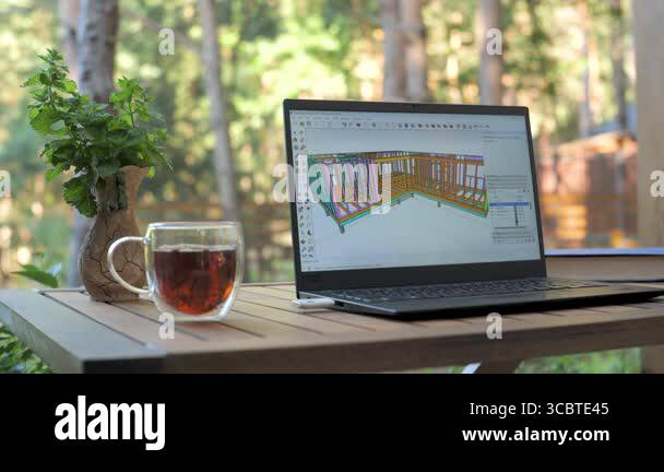 Architectural framing design on laptop in natural environment, Detailed ...