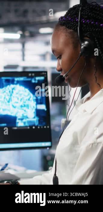 Vertical video Data center computer scientist using AI assistant to ...