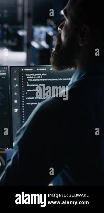 Vertical video Data center computer scientist using PC to monitor neural network using AI LLM ...
