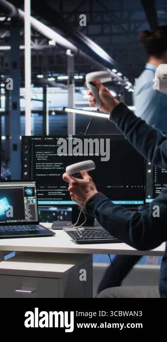 Vertical video Data center engineer using virtual reality, working on ...