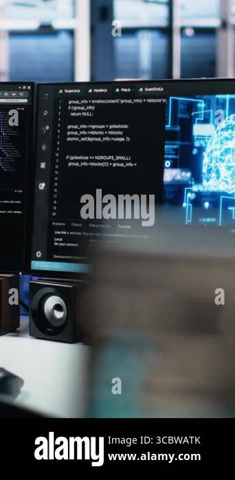 Vertical video Monitors in data center displaying AI tech software interface monitoring ...