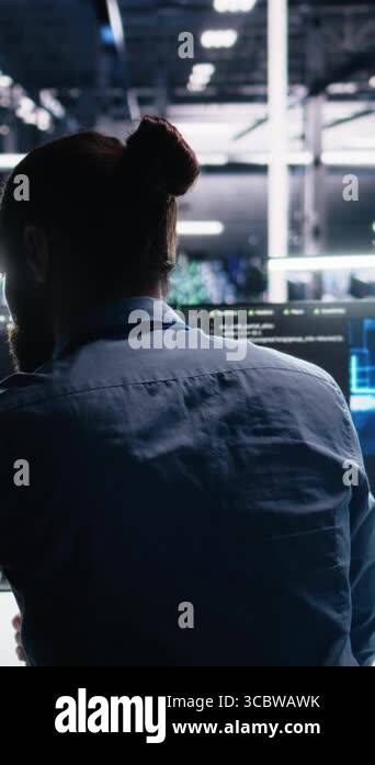 Vertical video Server room software developer using AI to review ...