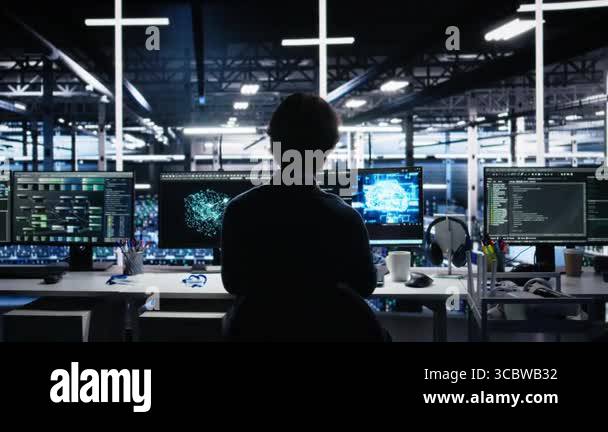 Data center engineer using computer to monitor neural network AI LLM ...