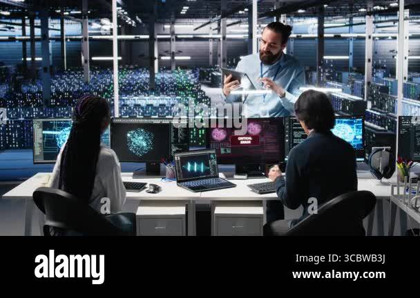 Data center manager coordinating programmers fixing critical error while using AI. Server room ...
