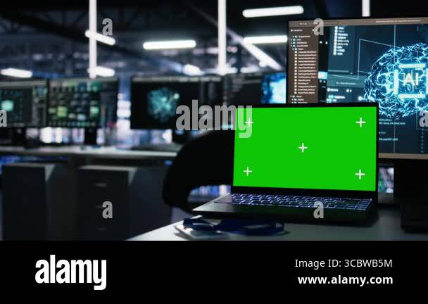 Close up of mockup laptop in data center doing neural network ...