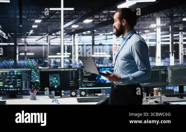 Data center manager showcasing AI technology, filming presentation ...