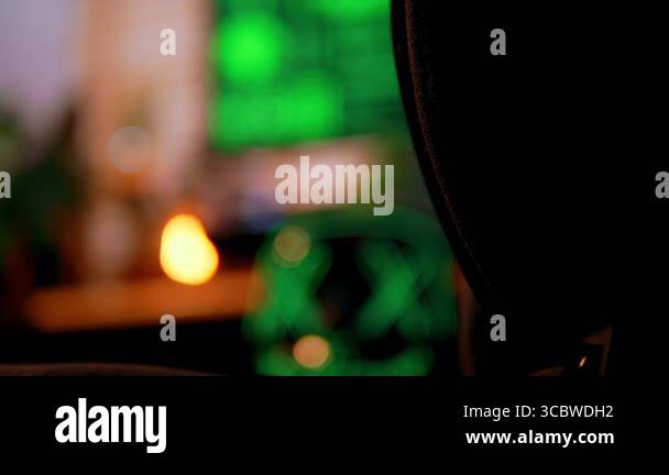 A glowing green hacker mask rests on a cinematic cyber desk. Triple ...