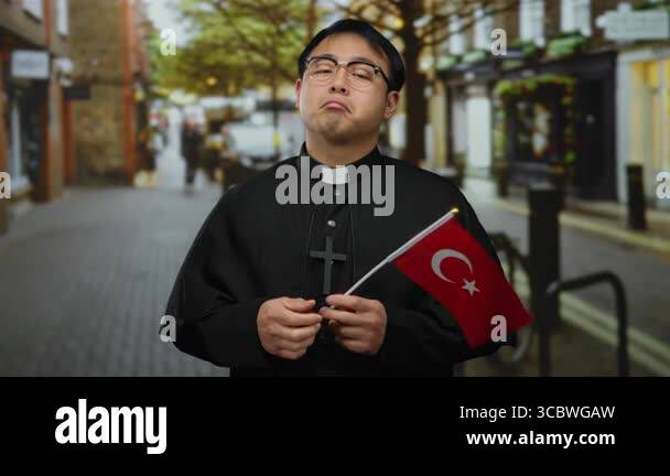 Priest holding turkish flag stands Stock Videos & Footage - HD and 4K ...