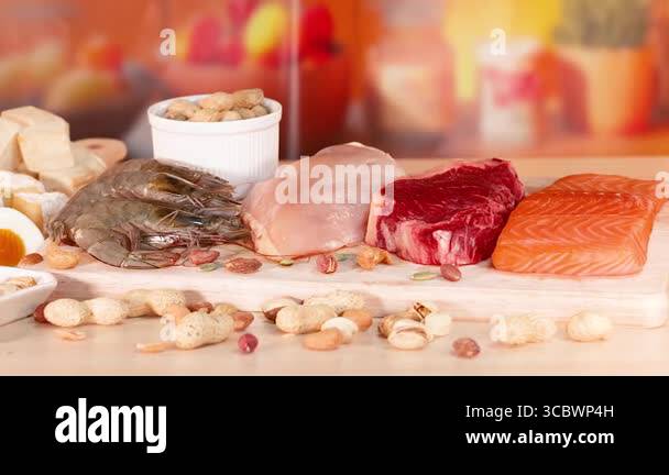 Variety of meats, nuts, and seafood arranged together Stock Video ...