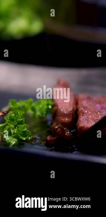 grilled squid pieces photo of mixed grilled meat platter. Beef, pork ...
