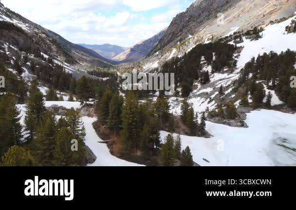 Breathtaking view of a snowy valley in the italian alps, surrounded by ...