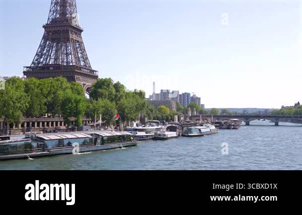 Panoramic view of the Seine River with Eiffel Tower boats and riverside ...