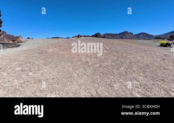 A breathtaking view that captures a dry, expansive terrain set beneath ...