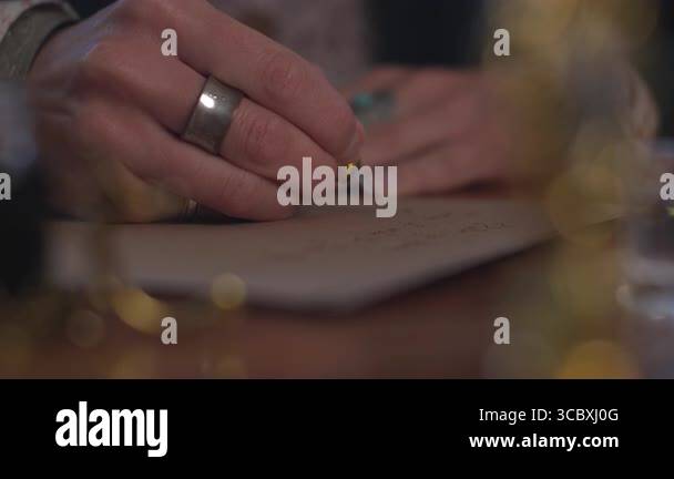 Girl writing a letter. Close-up of hands and handwritten letter. Ink ...