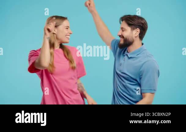 Funny pretty woman and man - happy couple having fun, favorite music ...
