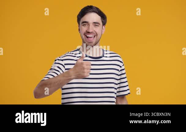 Positive man makes hand sign like, thumbs up gesture. Happy man ...