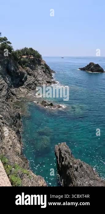 Azure sea and rock, mountains, Italy. Nature of Ligurian coast and ...
