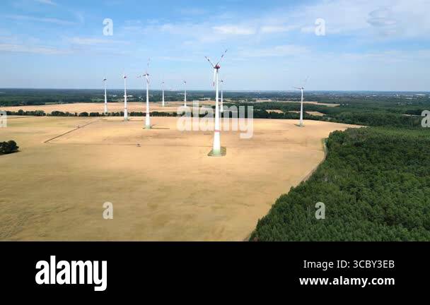 Wind power and green energy, wind turbines produce energy in the field, power extraction ...
