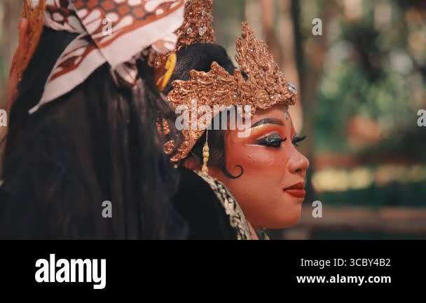 A close-up captures an intimate and gentle moment between a Javanese ...