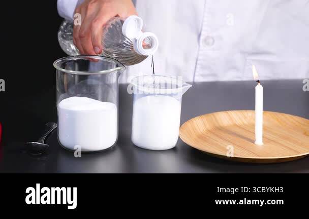 A science experiment demonstrates a chemical reaction creating bubbles ...